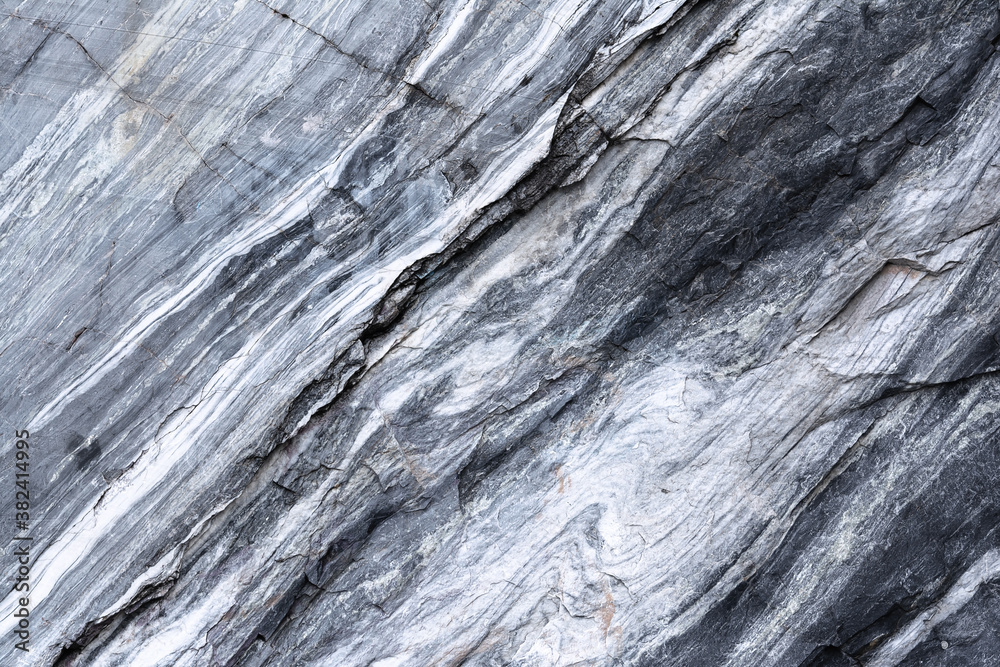 The texture of a marble rock with cracks and a pattern in the form of ...