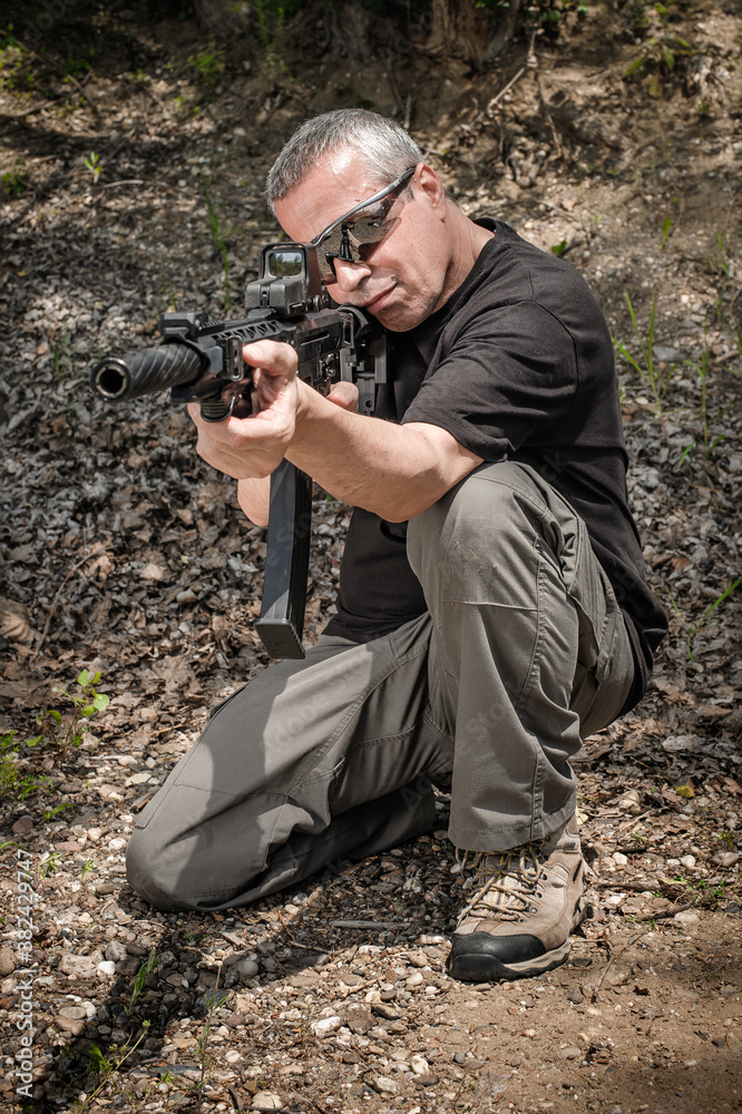 Front view gun point of rifle machine gun. Firearm shooting and ...
