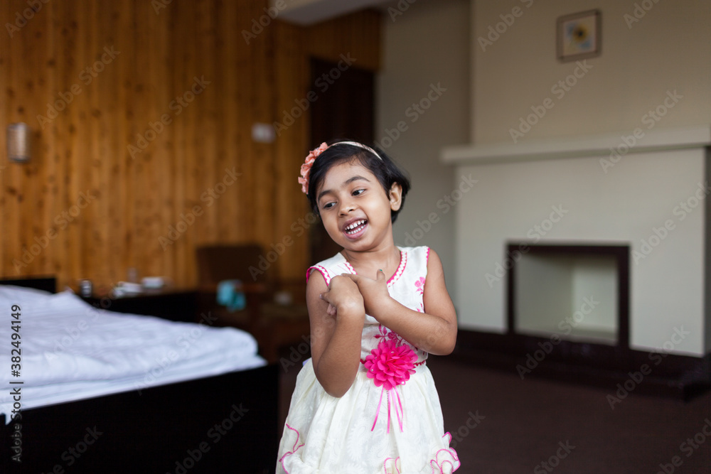 Little girl reciting rhymes and smiling Stock Photo | Adobe Stock