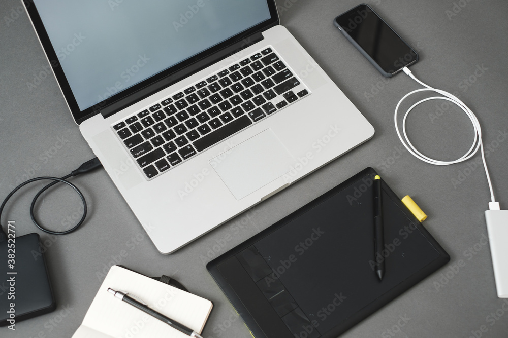 Laptop And Graphic Tablet On The Grey Background Stock Photo | Adobe Stock