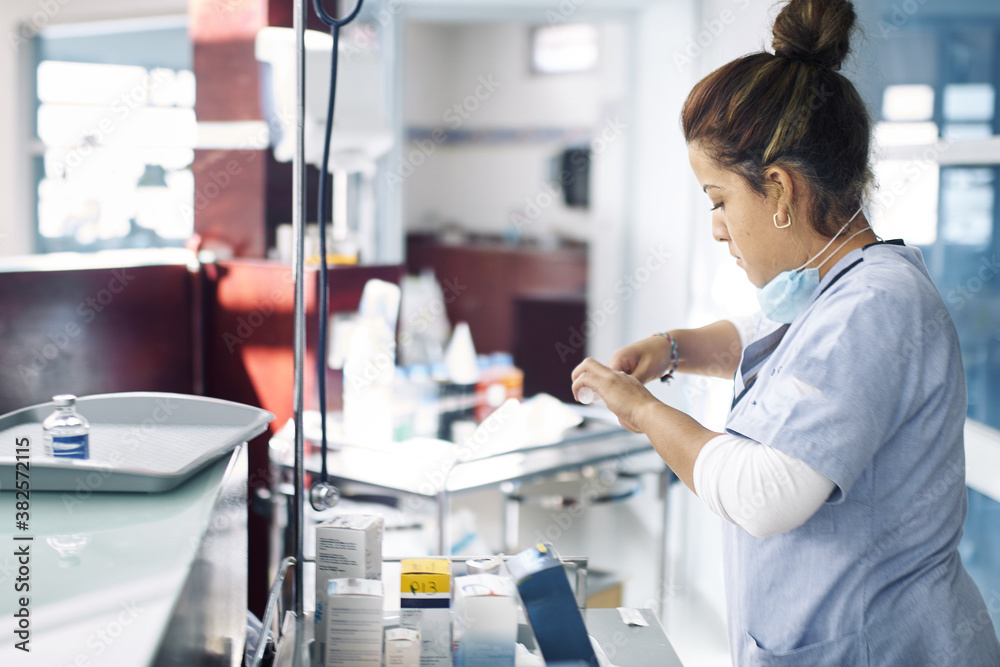 A nurse preparing medicine to a patient Stock Photo | Adobe Stock