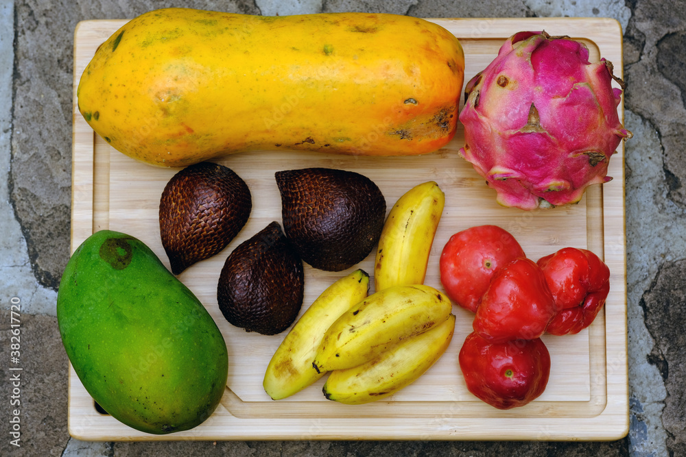 Indonesia Batam - Indonesian tropical fruits Papaya - Plum - Mango ...