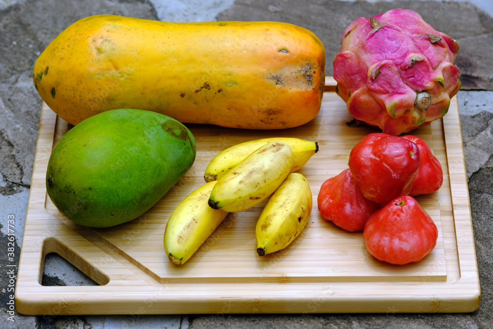 Indonesia Batam - Indonesian tropical fruits Papaya - Plum - Mango ...