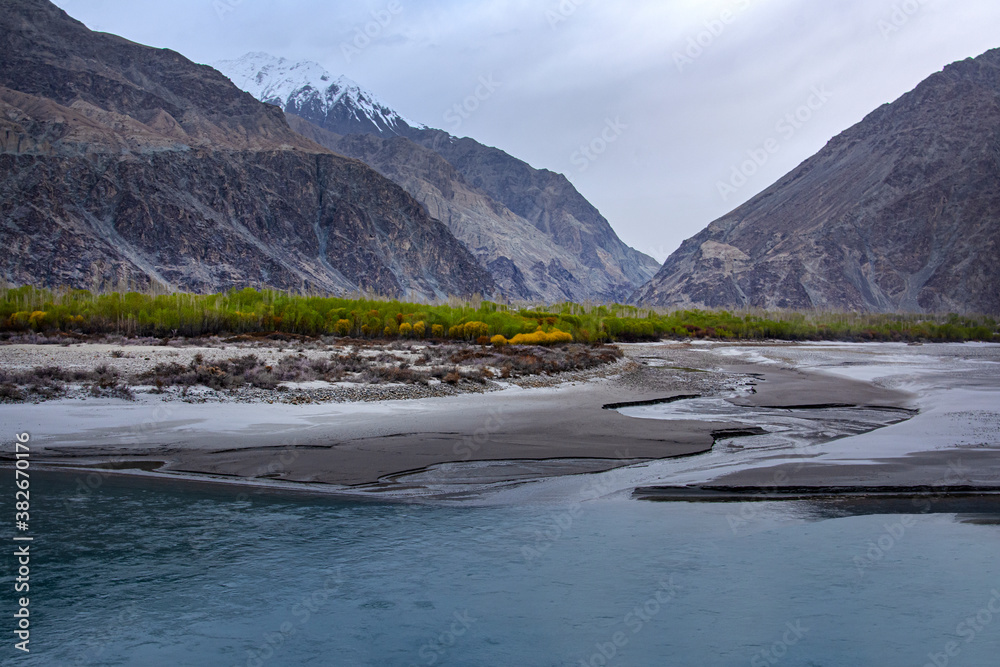 Indus river with spring trees in background in skardu Stock Photo ...