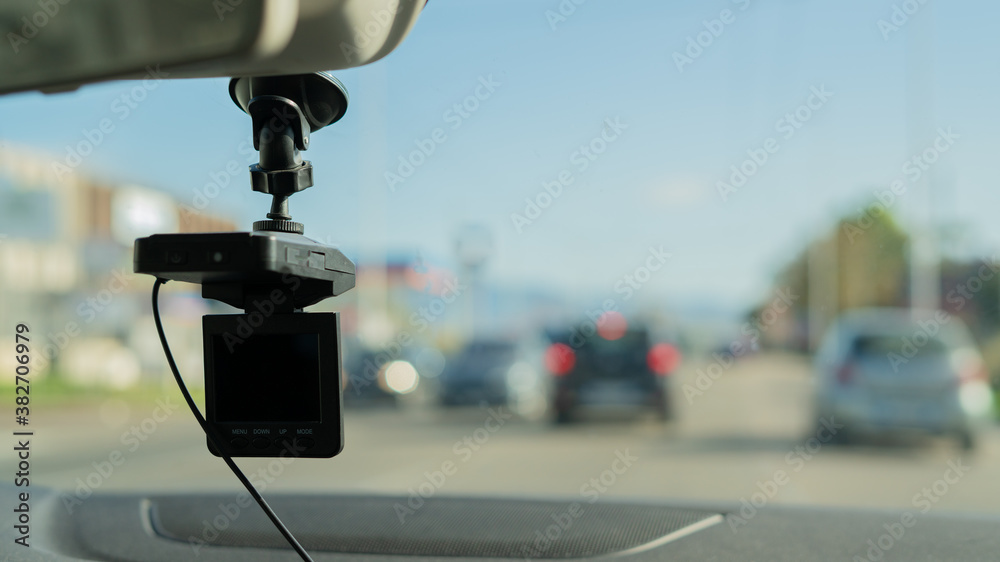 Car video camera (dash cam) inside of car on highway with blurred ...