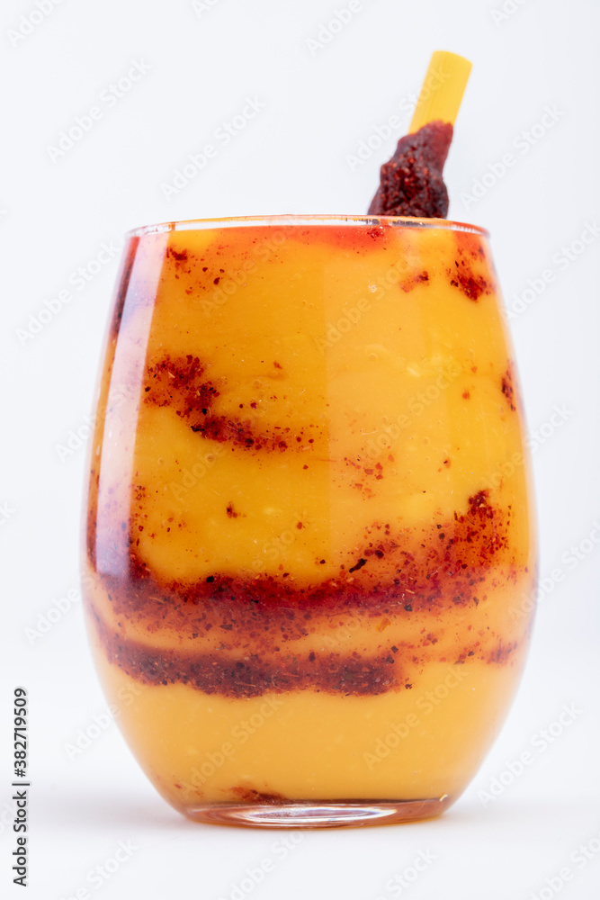 Chamoyada is a smoothie made of mango, chamoy, sugar and ice dressed ...