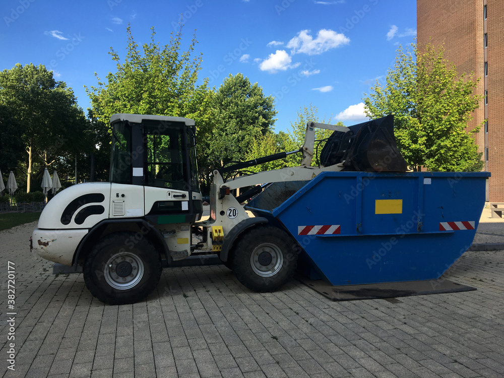 Blue skip container for the transportation of various waste and ...
