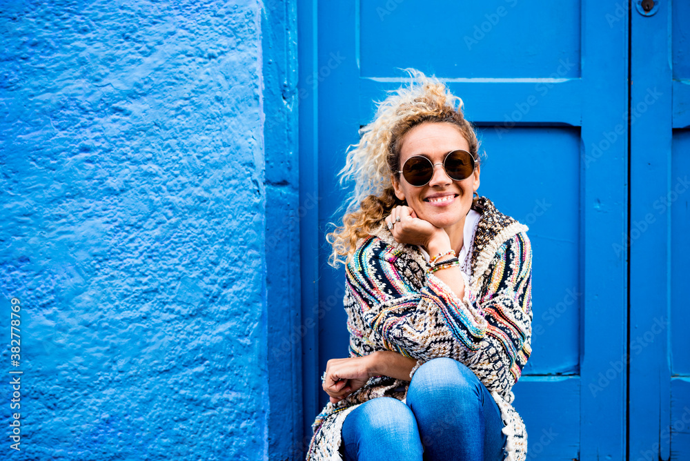 Cheerful adult beautiful woman portrait in the blue color - happy ...