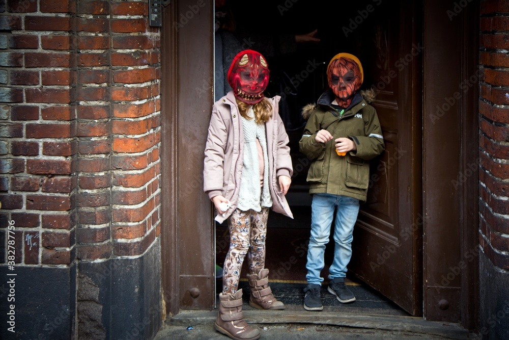 COPENHAGEN, DENMARK - OCTOBER 12, 2015. Two children in jackets and ...