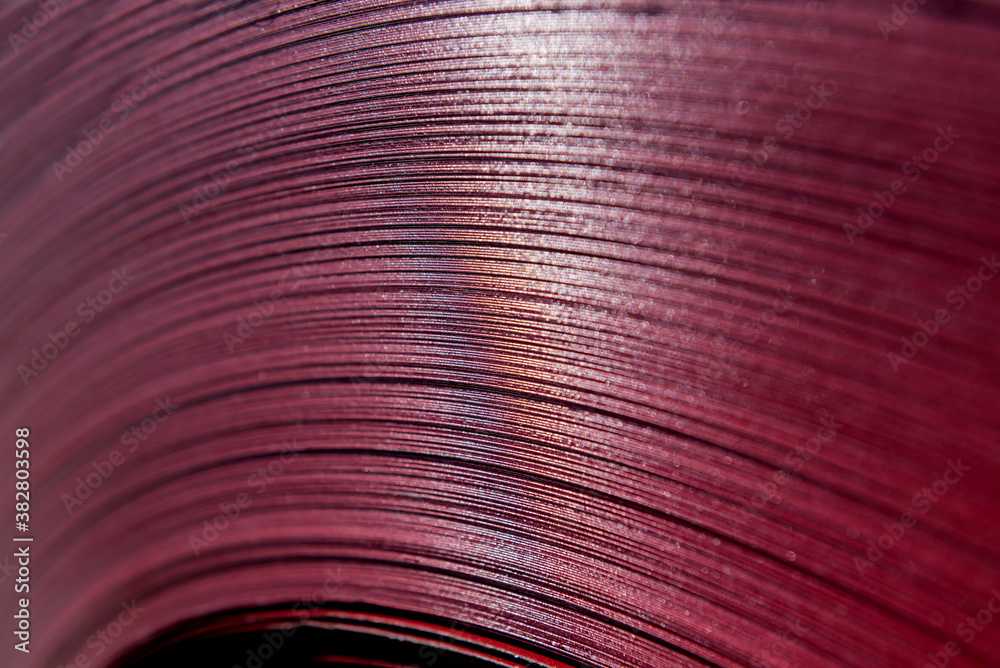 Curved lines of rolled metal are made of sheet steel. Stock Photo ...