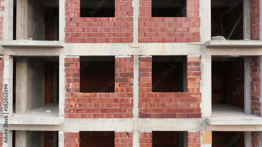 Video „Exterior, non load bearing, red brick walls on a reinforced ...