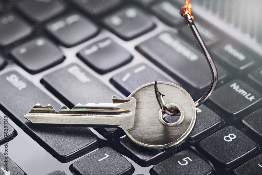 phishing, hacking personal data and money , key and hook on computer ...