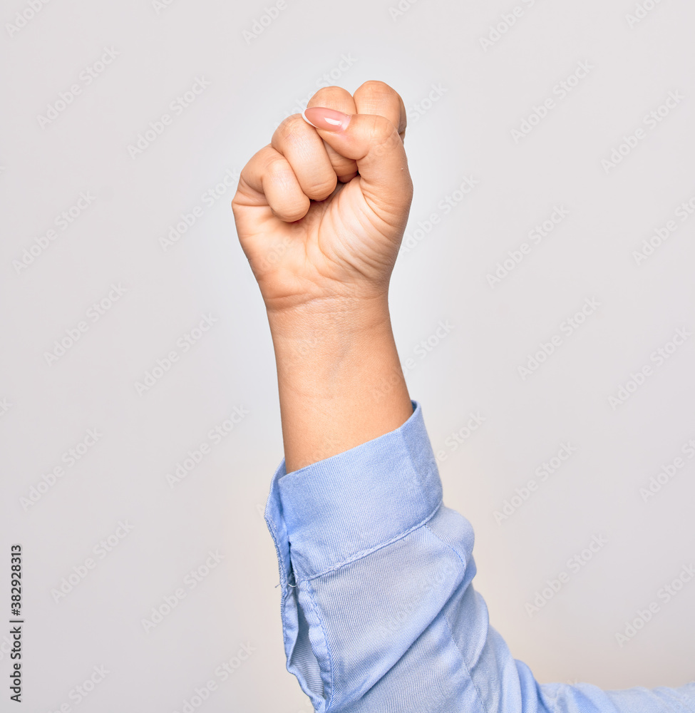 Hand of caucasian young activist woman doing protest sign with closed ...