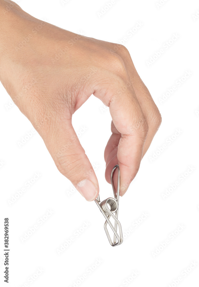 Hand holding stainless clothespin isolated on white background Stock ...
