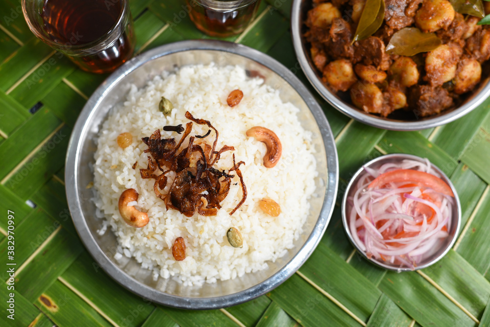 Ghee rice, Neychoru, Pulao made of Basmati rice on green palm mat ...