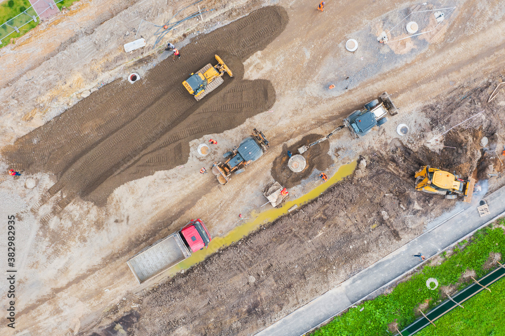Construction of a city street, laying of communications, installation ...