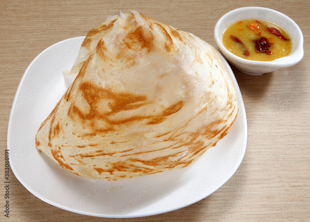 Roti tissue, roti tisu, or tissue prata is a sweet flatbread often sold ...