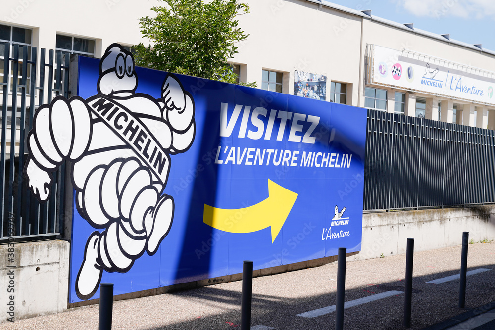 Foto de Michelin l'aventure bibendum logo sign and text front of ...