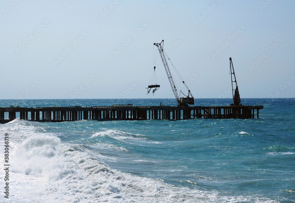 Military pier in the black sea in Abkhazia. The pier is used for ...