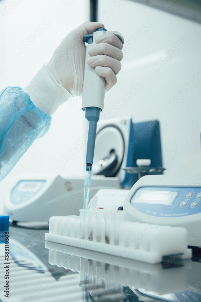 Taking measurements of substances with modern pipette dispenser Stock ...