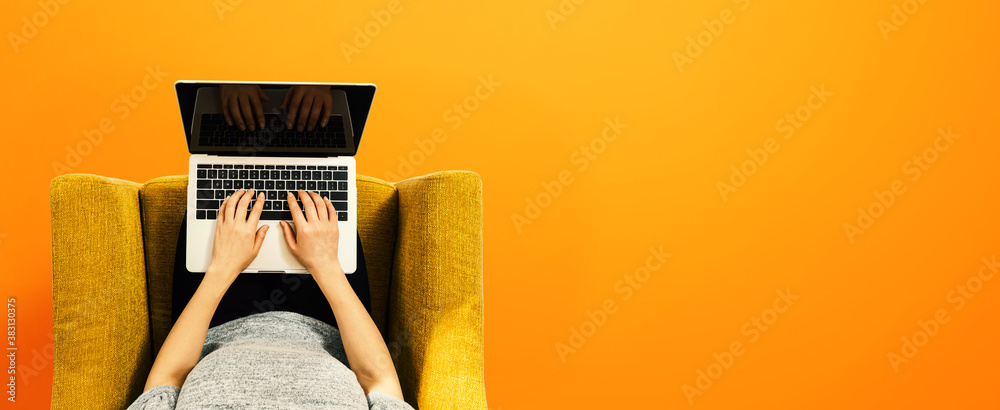 Woman using a laptop computer overhead view Stock Photo | Adobe Stock