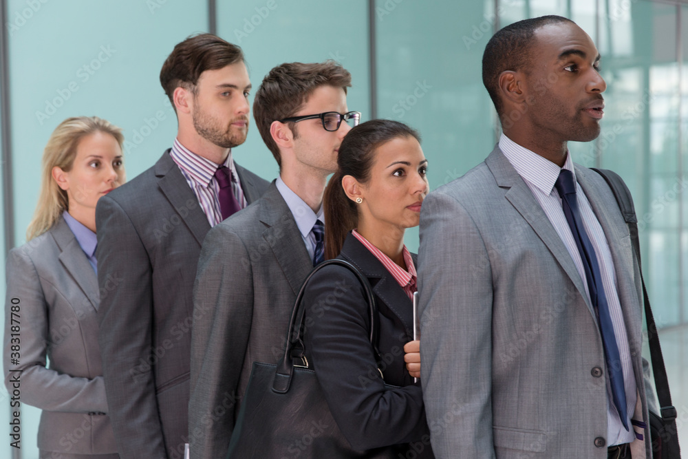 Business people waiting in queue Stock Photo | Adobe Stock