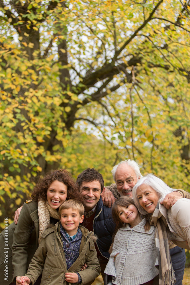 Portrait happy multi-generation family in autumn park Stock Photo ...