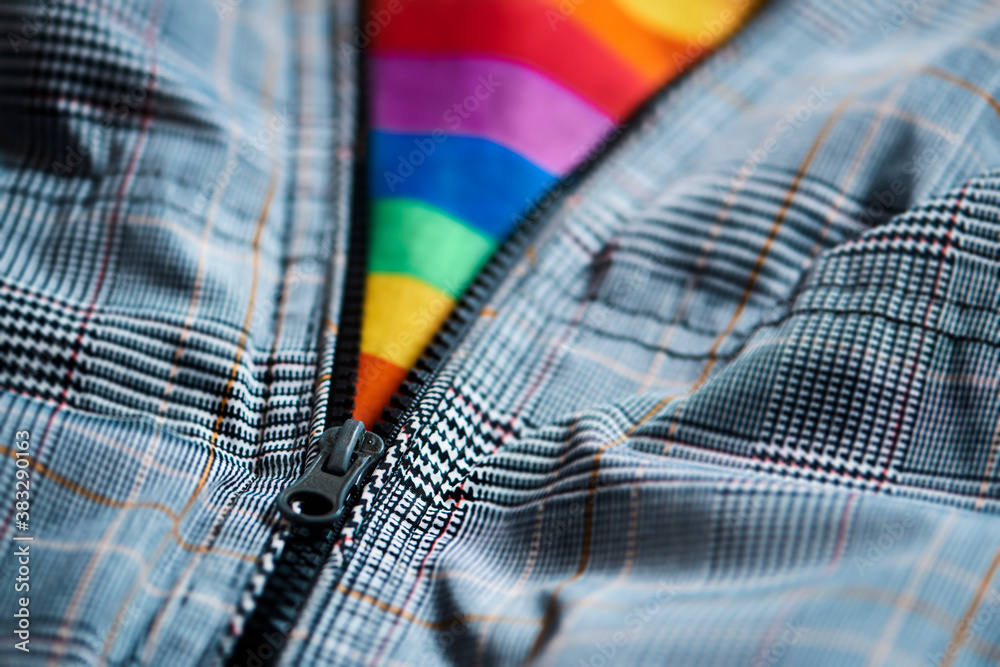 gay pride flag coming out from a jacket Stock Photo | Adobe Stock
