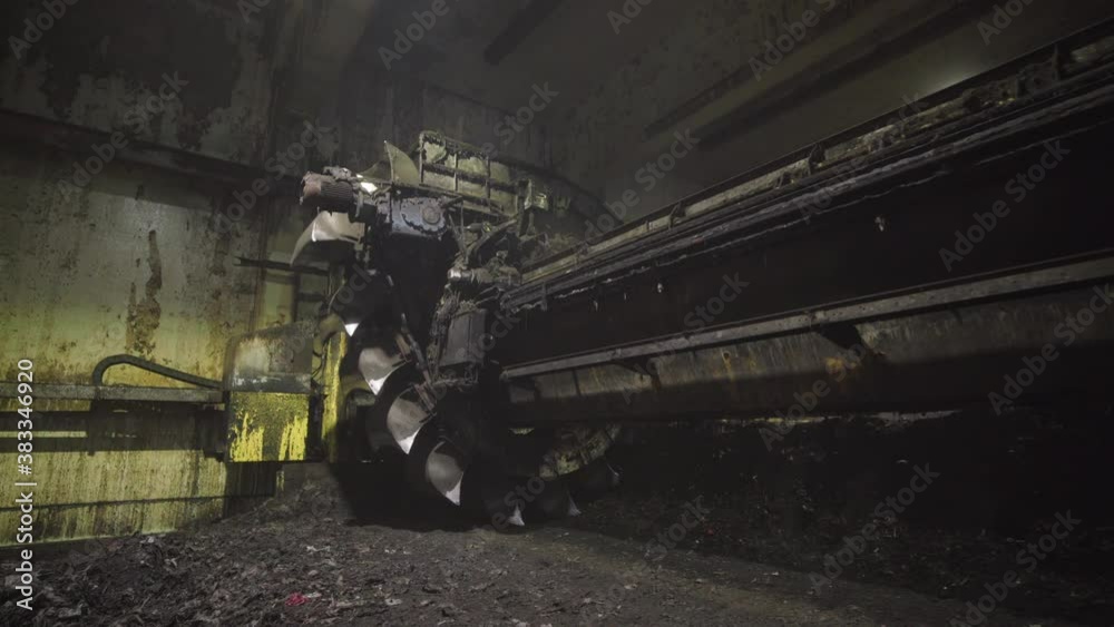 Push out of a moving bucket wheel transporting organic waste on a ...