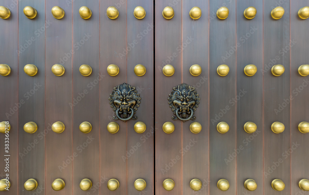 The door and knockers of Chinese temple. Ancient Asian door from temple ...