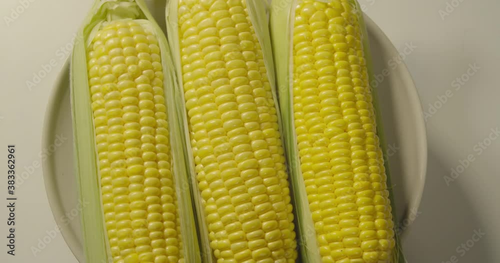 Top down view of sweet fresh corn spinning in a circle. Beautiful fresh ...
