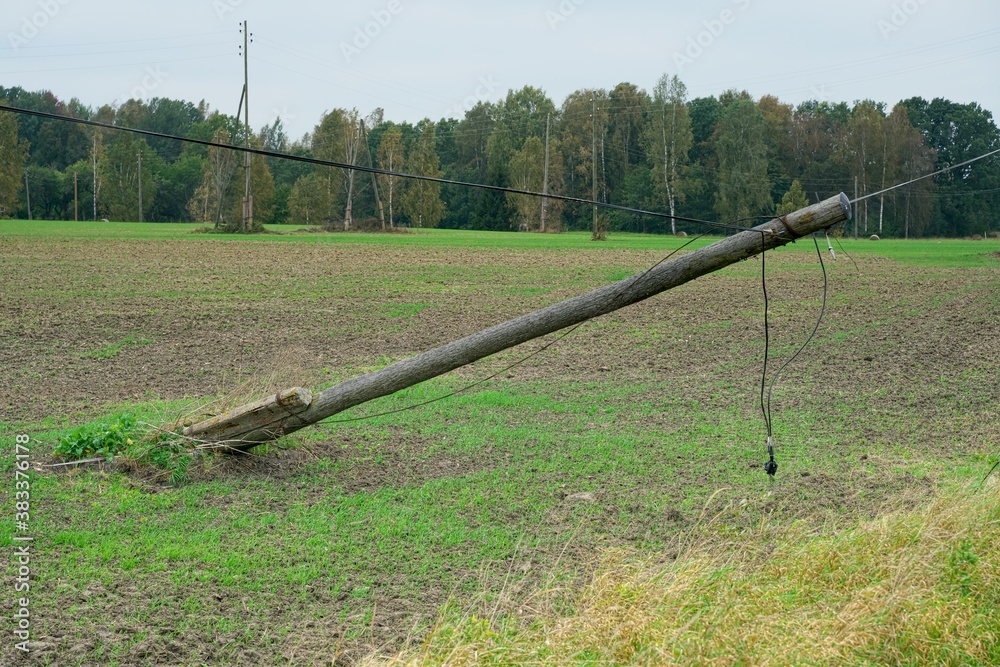 a pole with electrical wires fell by the roadside. the accident at the ...