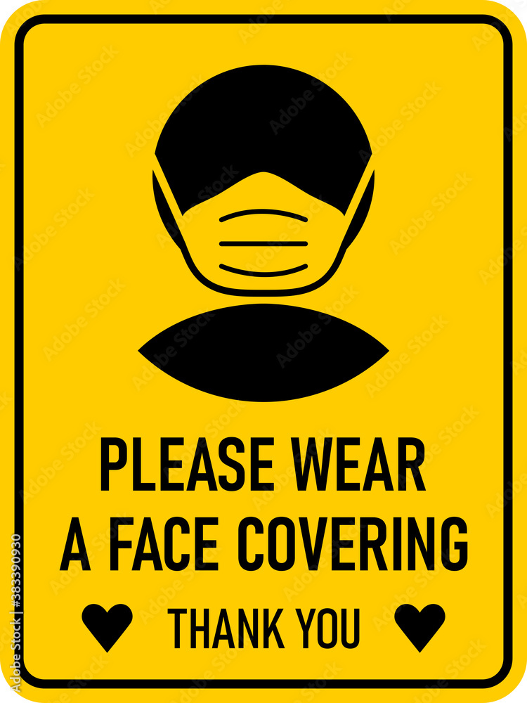 Please Wear a Face Covering Thank You Vertical Warning Sign against the ...