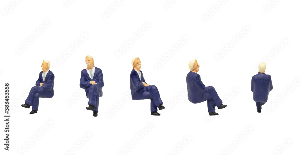 Miniature people as seated passenger isolated on white background ...