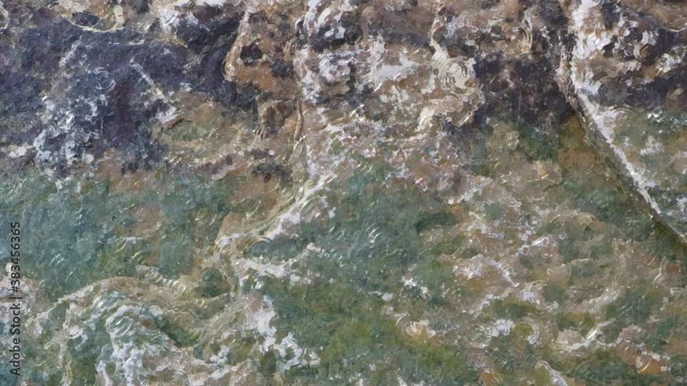 Rain drop heavy on mineral and hard granite stone surface of cave for ...