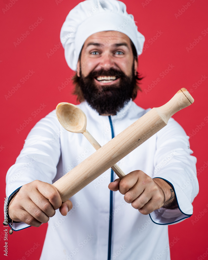confident chef male with beard and moustache in cook uniform using ...