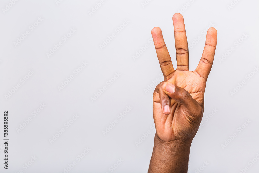 Number three. Afro-American black man's hand showing different gestures ...