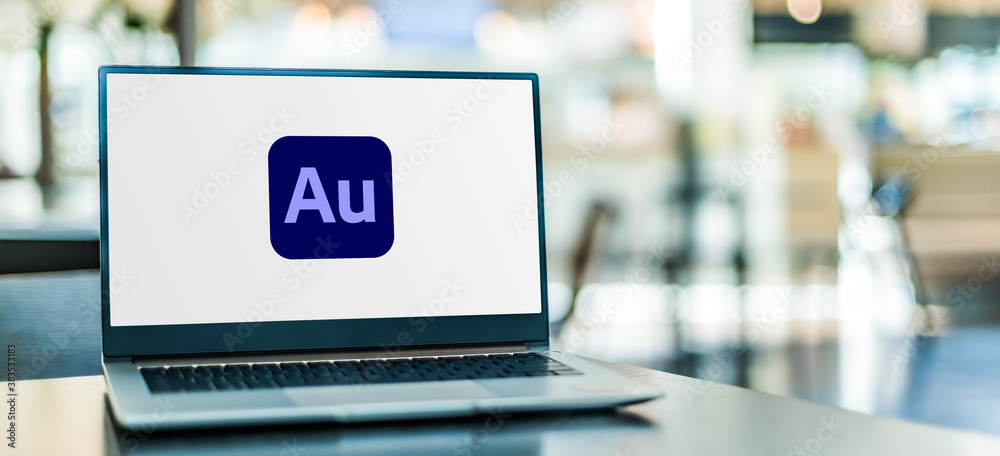 Laptop computer displaying logo of Adobe Audition Stock Photo | Adobe Stock