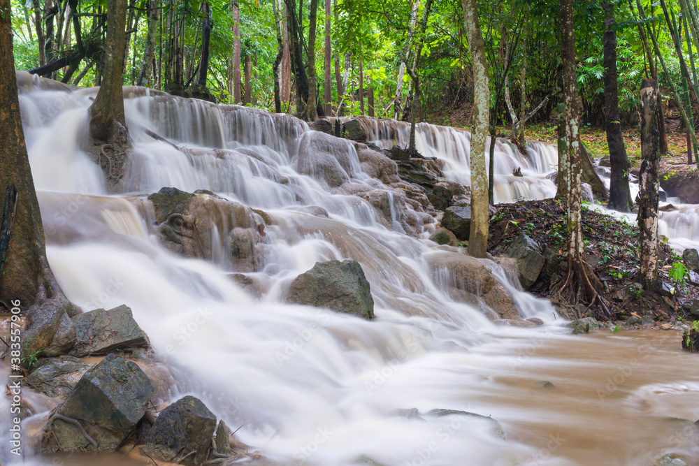 Waterfall scene at Pha Tad Waterfalls in rainforest at the Khuean ...