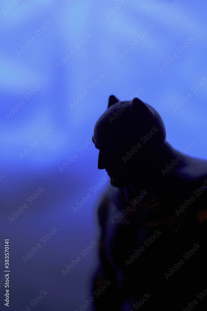 NEW YORK USA - NOV 11 2017: Batman action figure silhouetted against ...