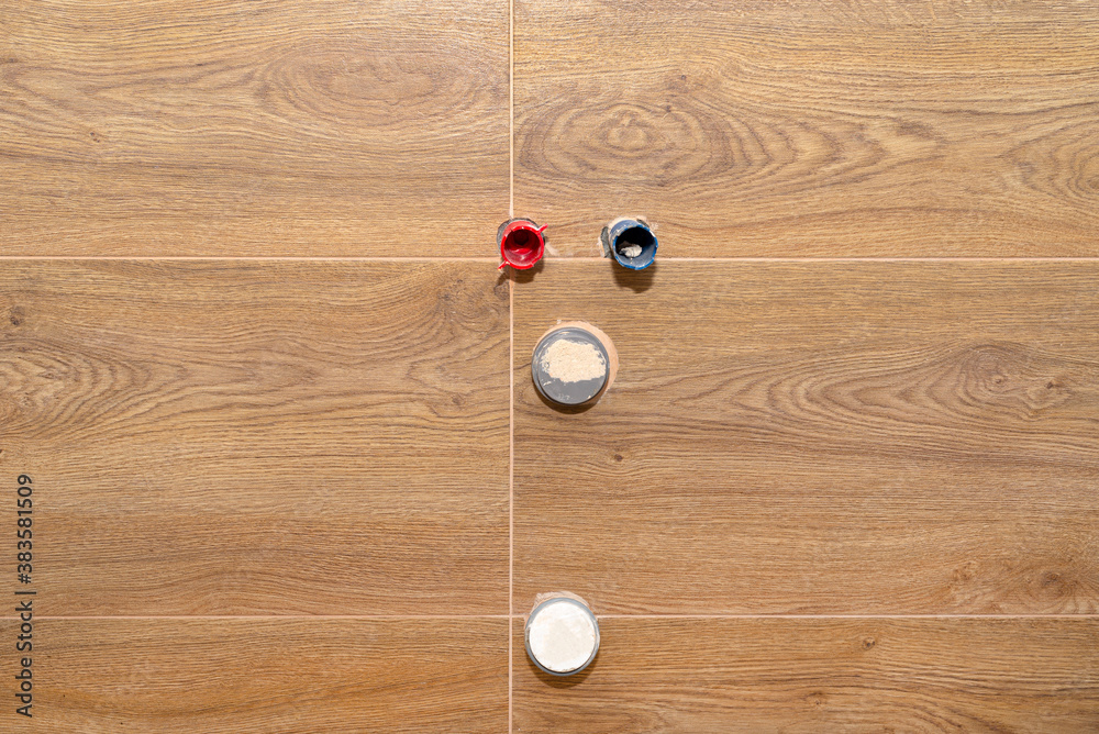 Double water pipe and sewer pipe coming out of the wall in a modern ...