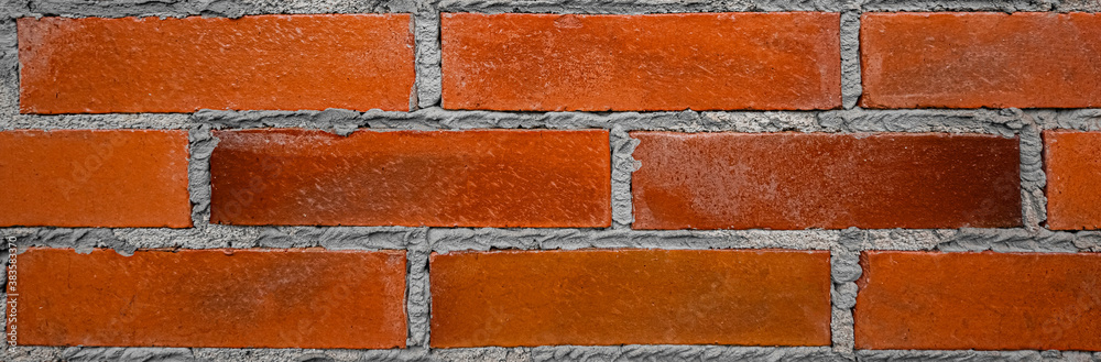 The old wall was built of orange-red mud bricks with a rustic shabby ...
