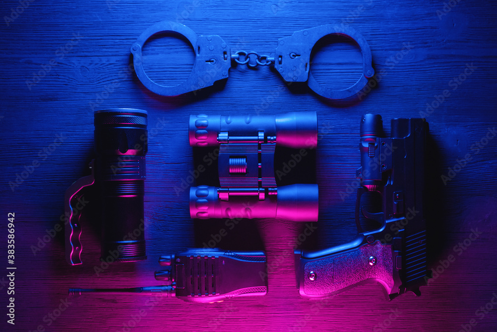 Spy secret service agent desk table concept background. Gun, radio ...