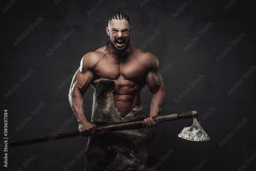 Furious and angry nord warrior with muscular build and dreadlocks ...