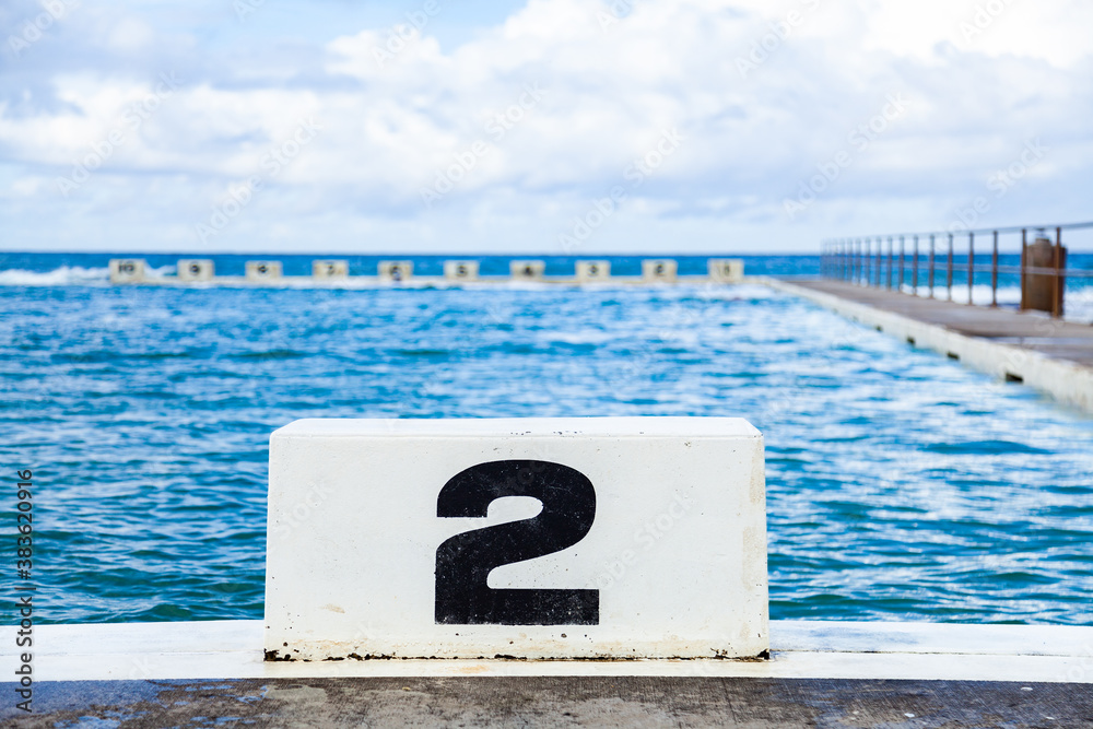 Numbered swimming lanes at ocean pool Stock Photo | Adobe Stock