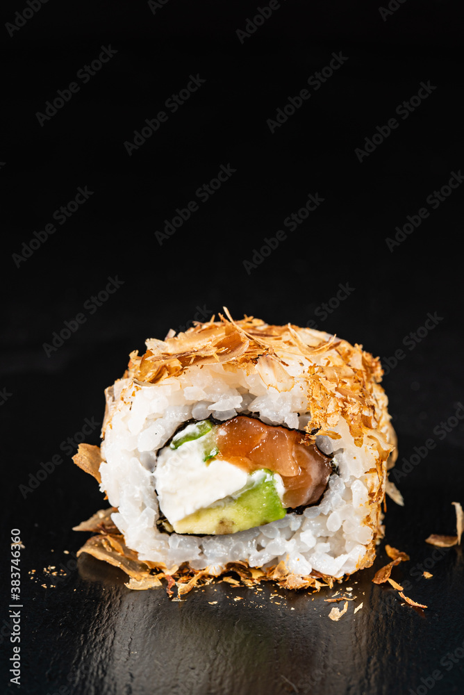 sushi on the black background Stock Photo | Adobe Stock