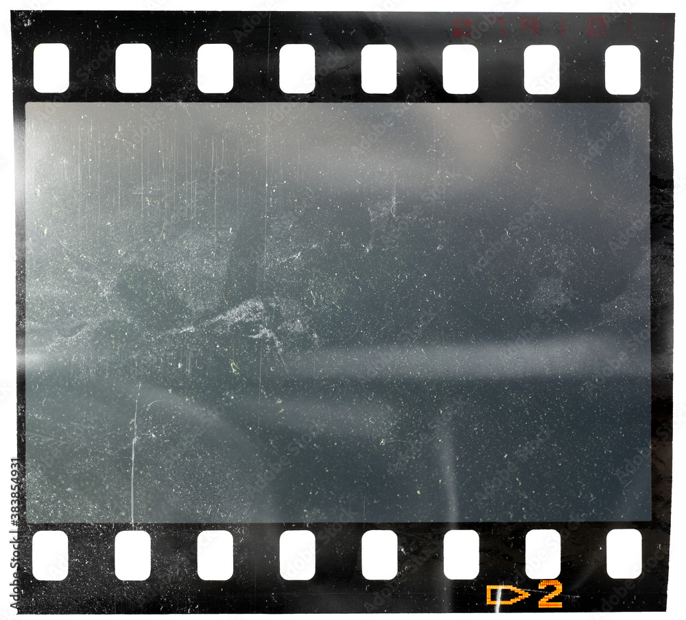 super grungy and dusty empty 35mm film strip isolated on white ...