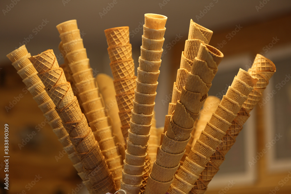 An ice cream cone, poke or cornet is a dry, cone-shaped pastry, usually ...