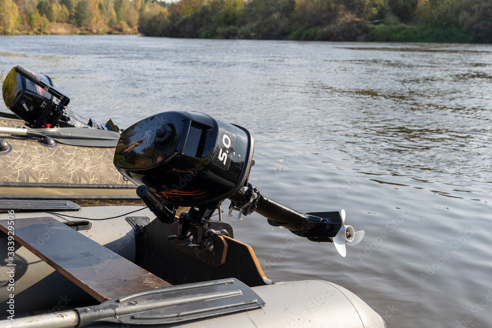 Poster outboard motor on a boat over water – Wall Art | UkPosters