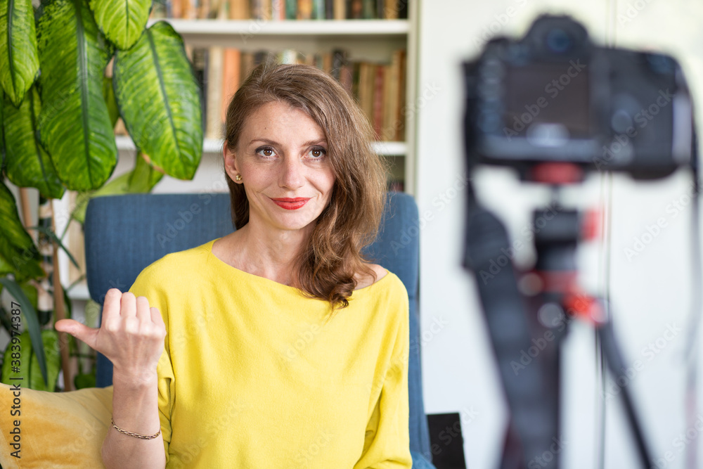 teacher or vlogger recording a lesson on camera online learning Stock ...